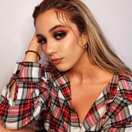 Darcie loves "freaking people out" with eerily realistic face paint